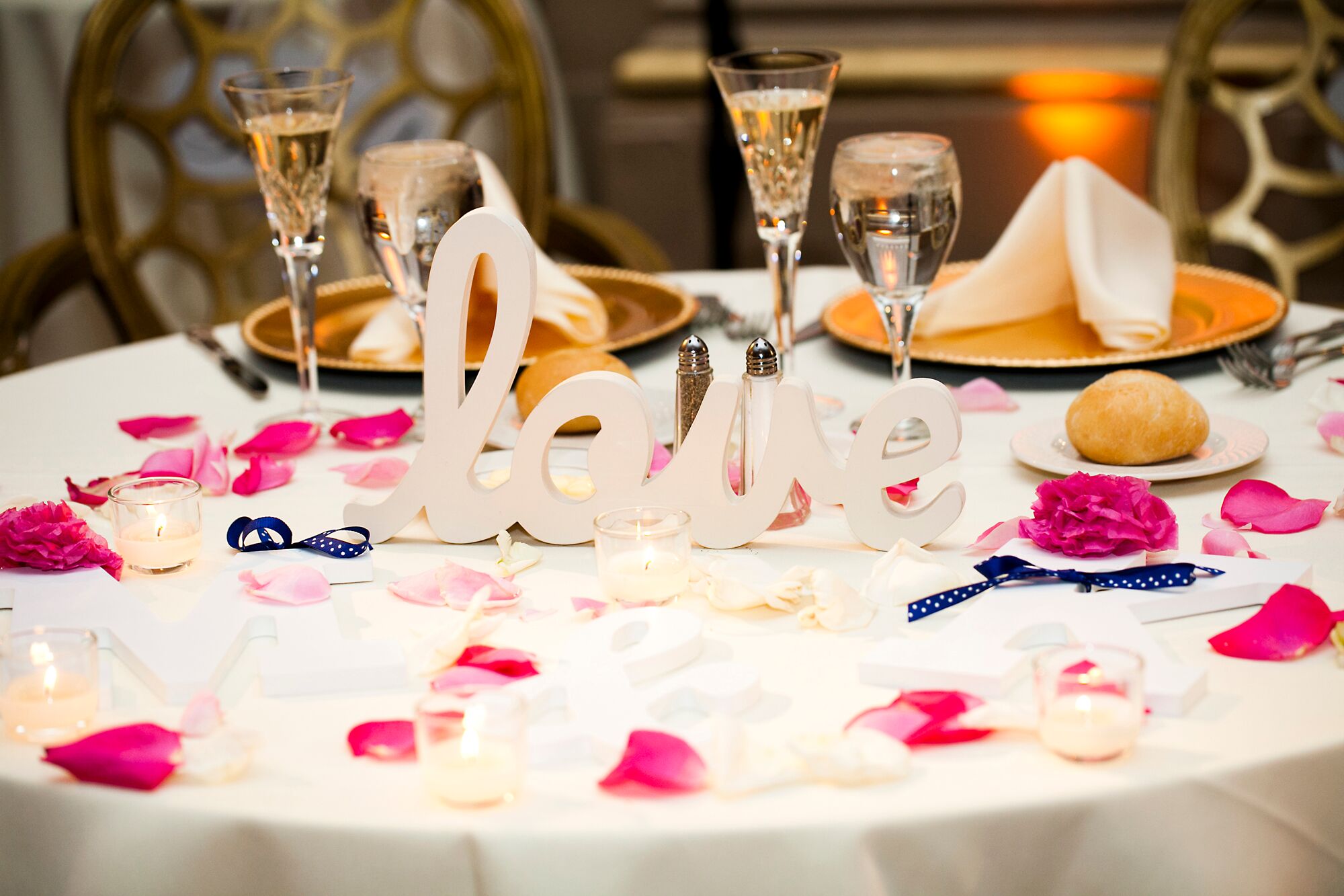 White "Love" Sign on Sweetheart Table