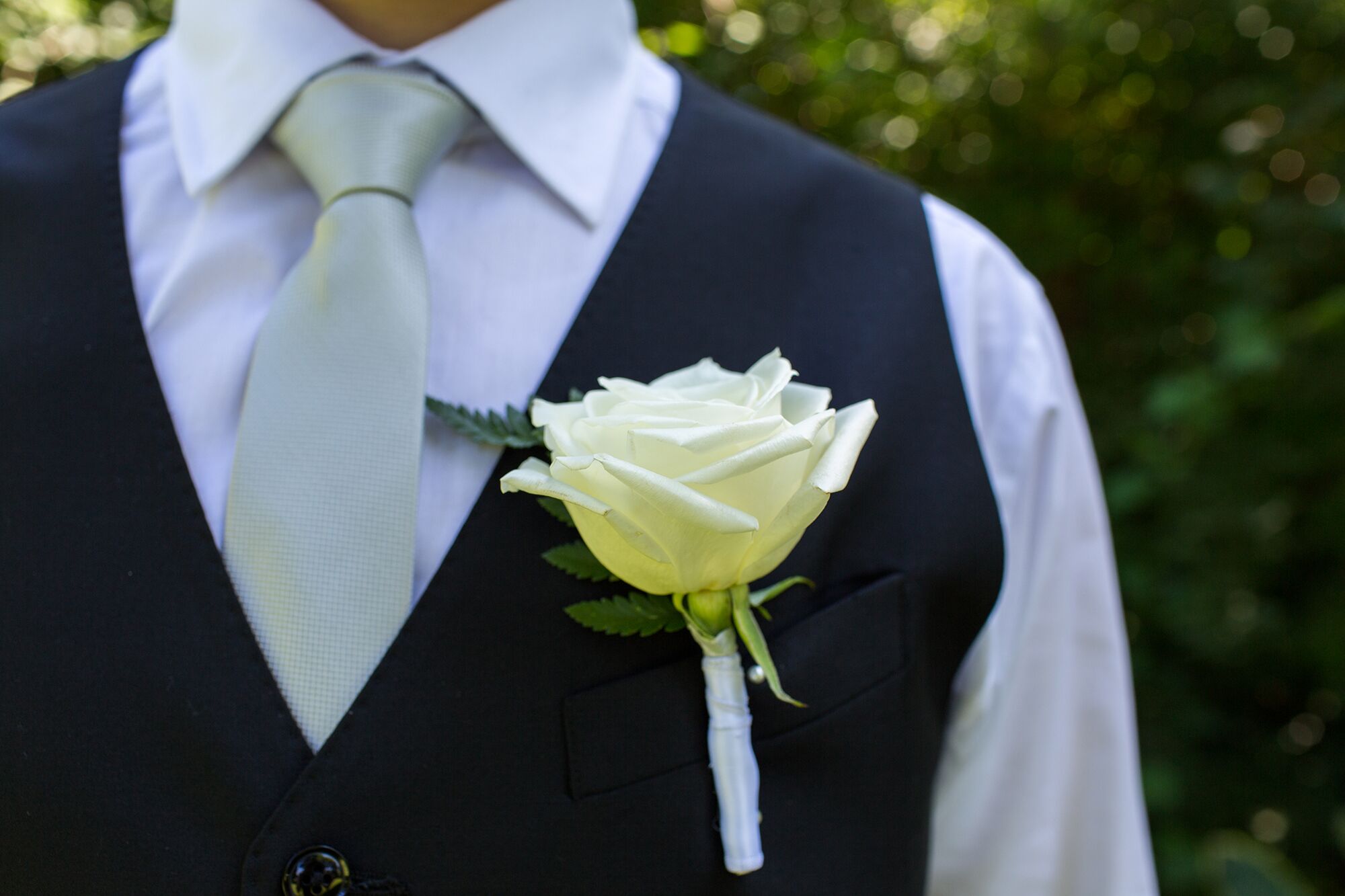 Single Rose Boutonniere on Groom