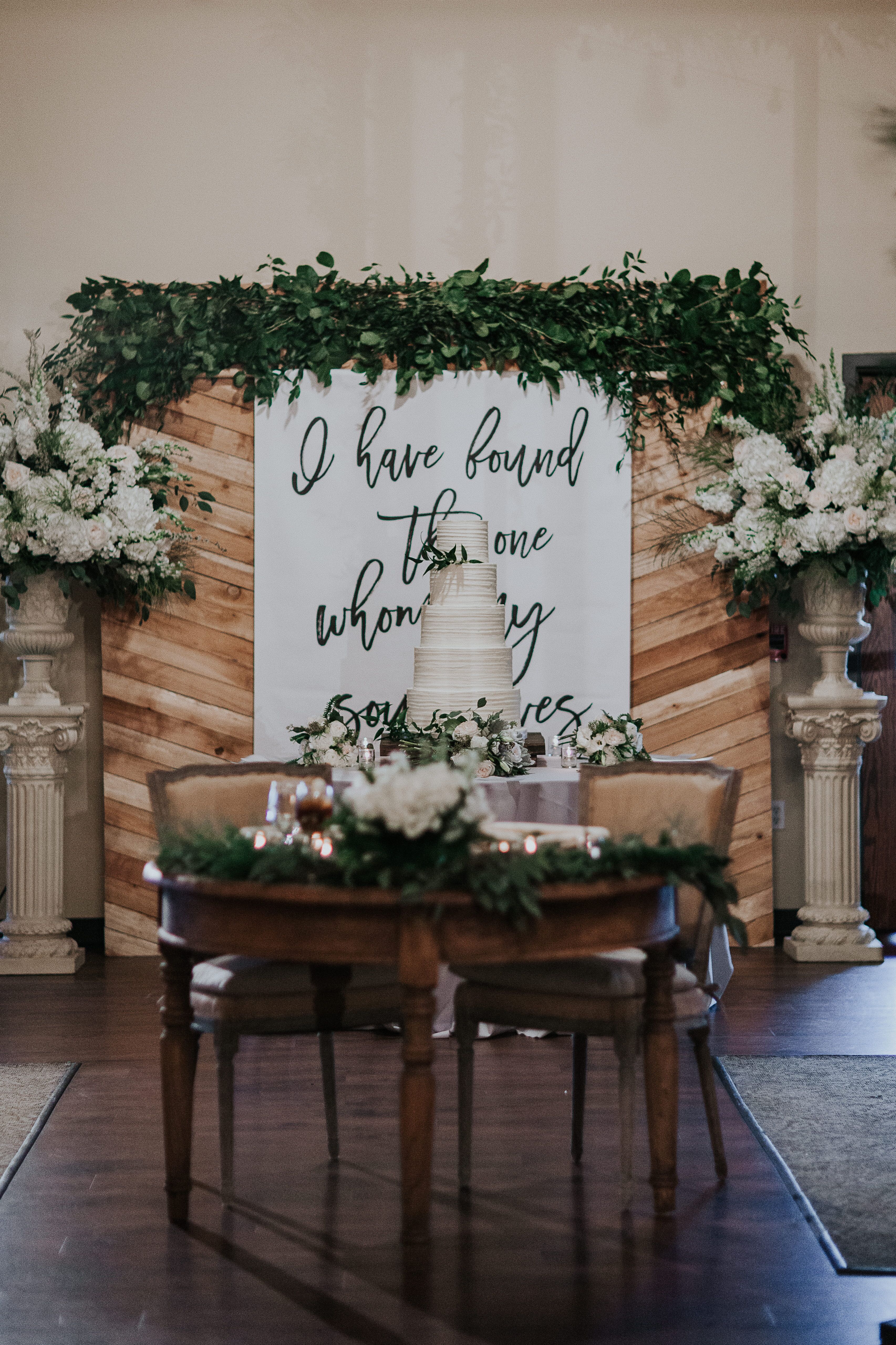 Sweetheart Table with Custom Calligraphy Sign and Greenery