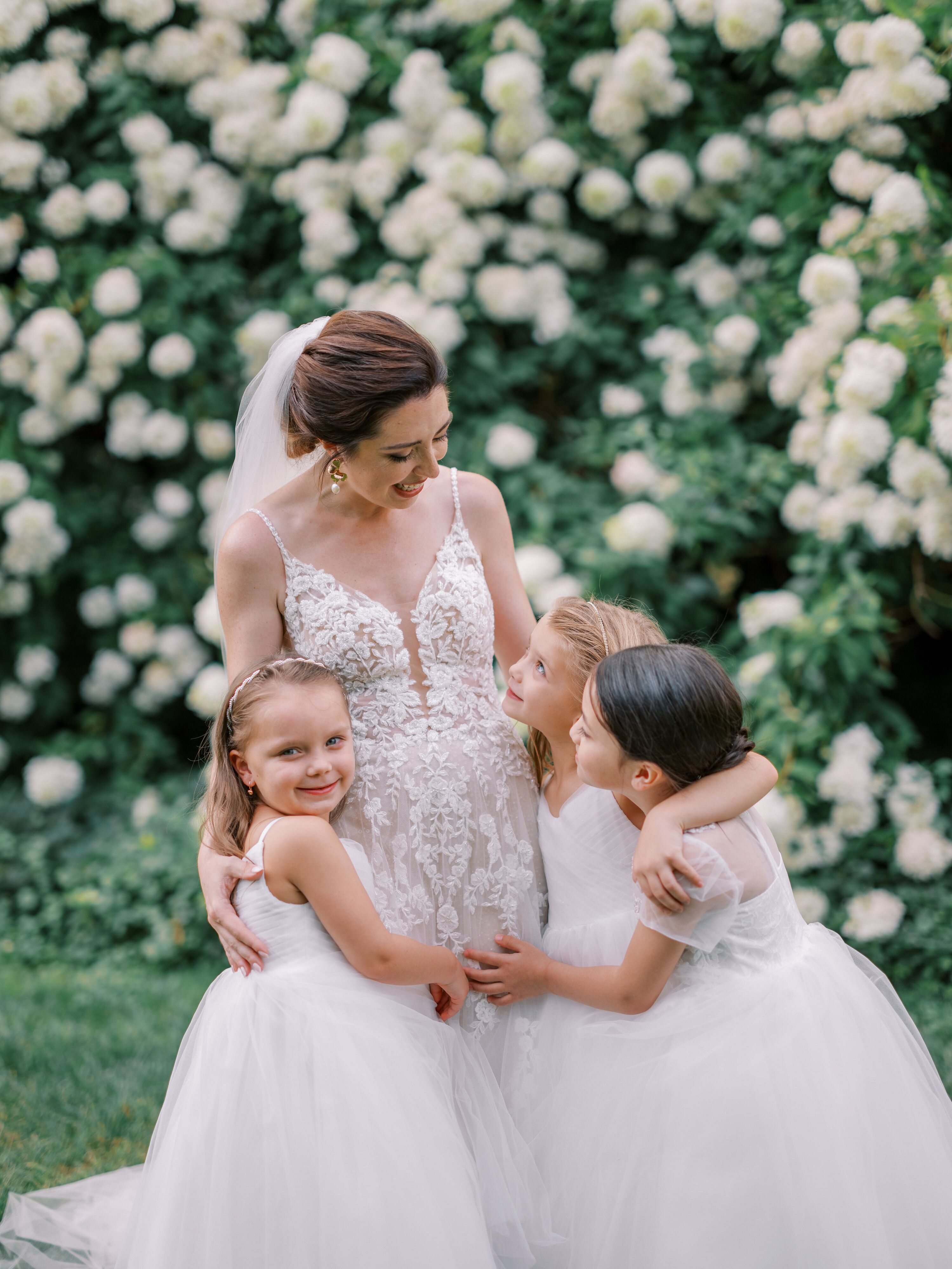 Bride With Drop Earrings, Fitted Gown With Three Flower Girls in Tulle ...