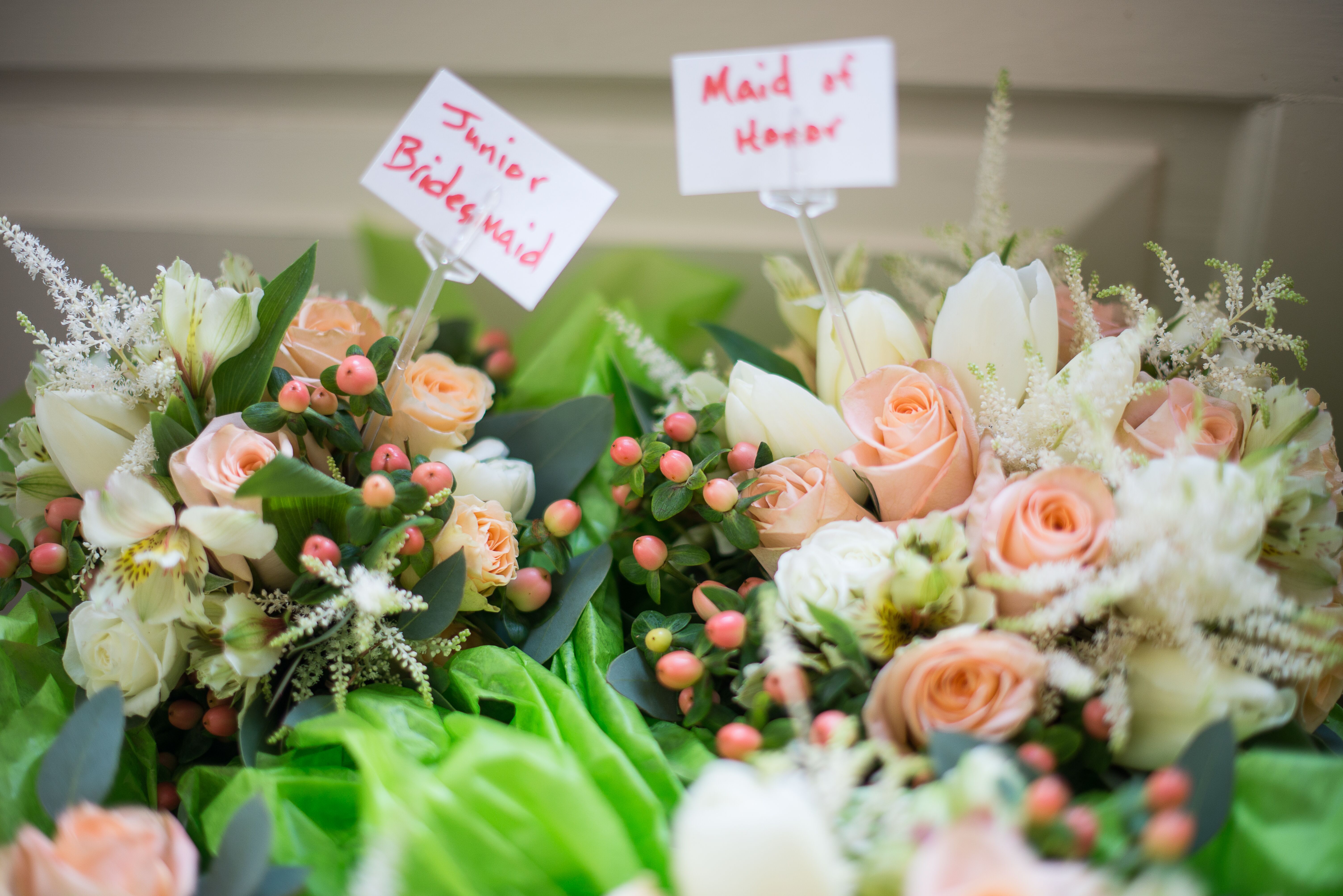 Peach and White Rose Bouquets With Hypercium Berries
