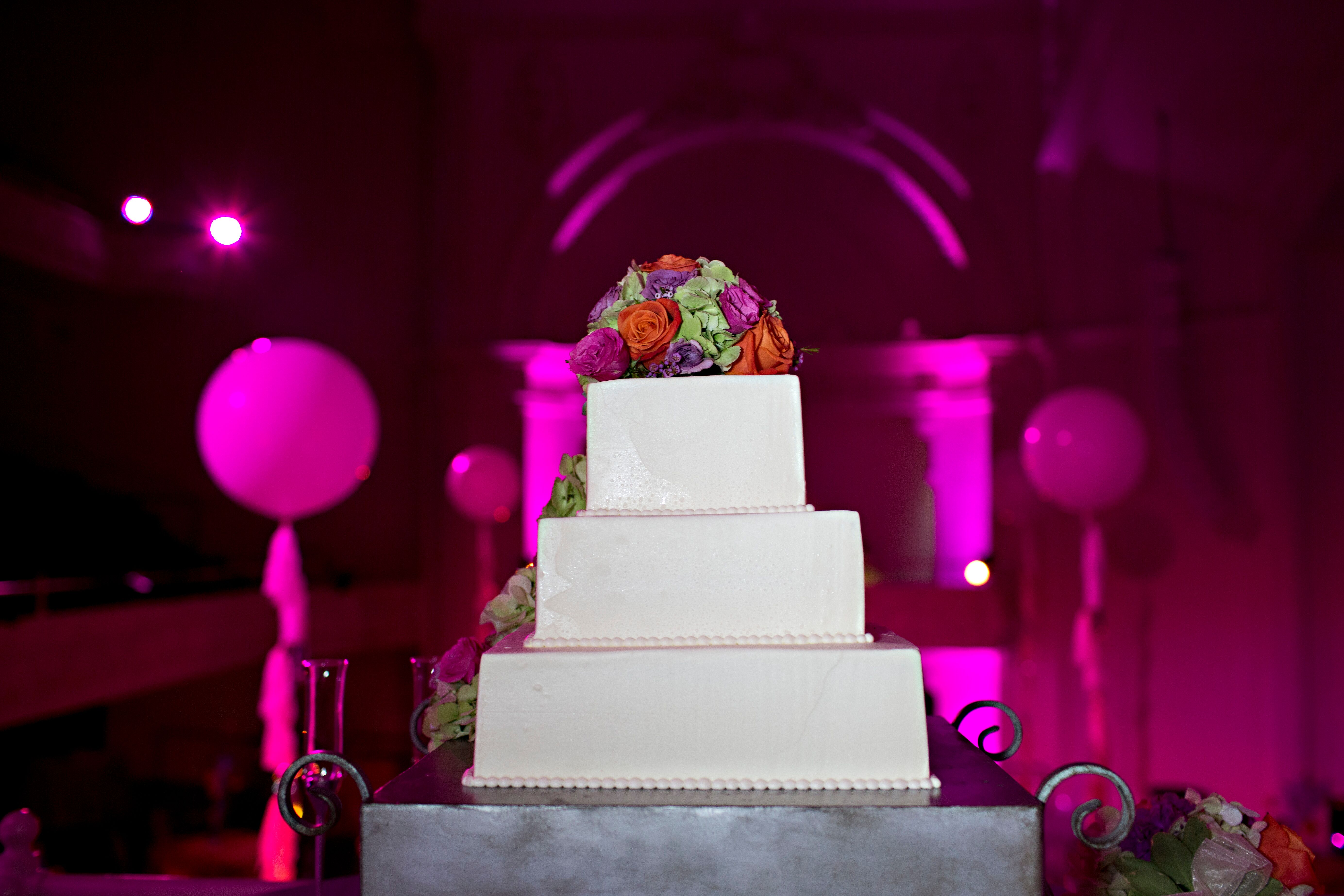 Tiered Wedding Cake with Cascading Floral Accents