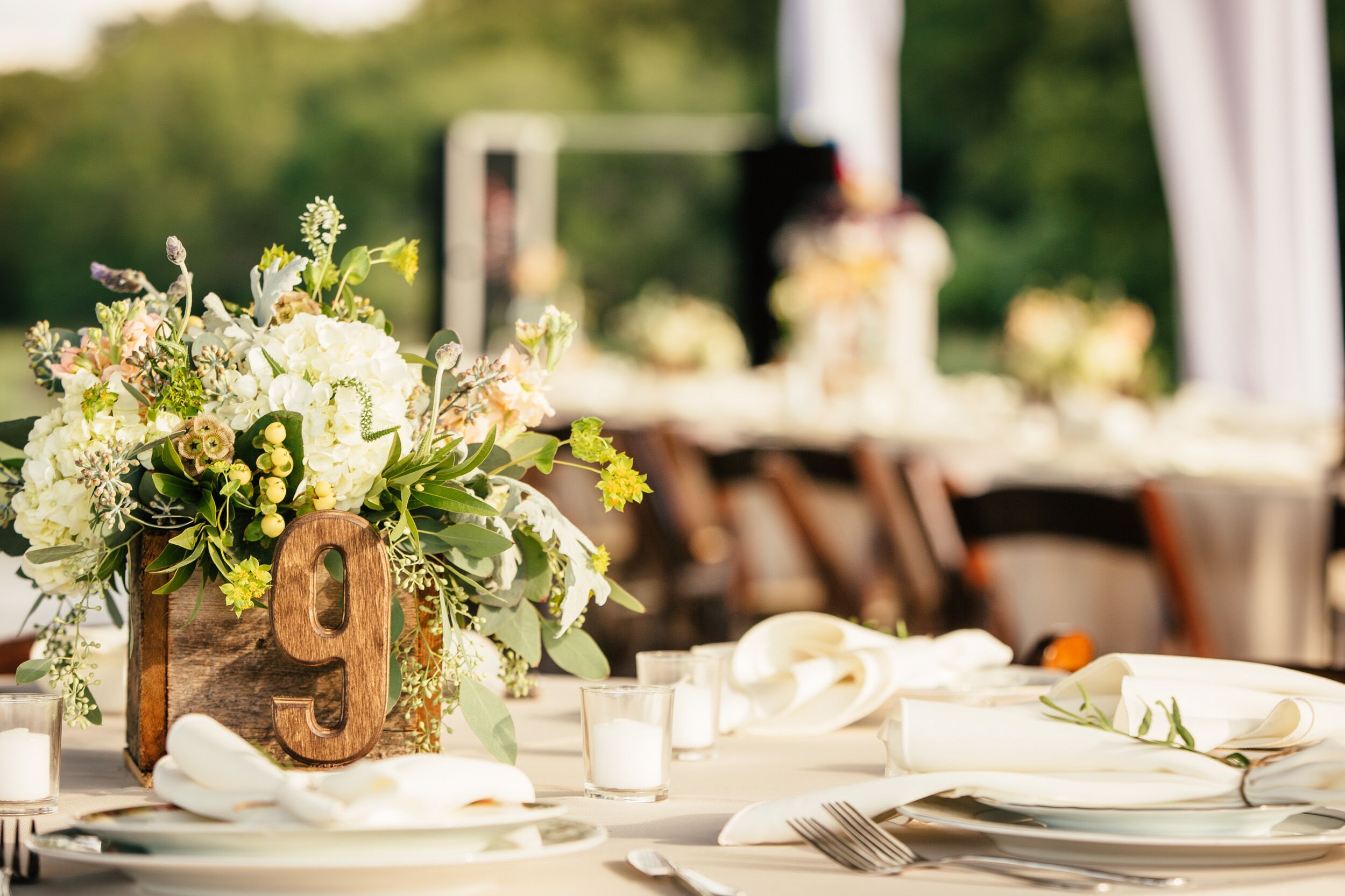 Rustic Wooden Table Number with Natural Floral Centerpiece