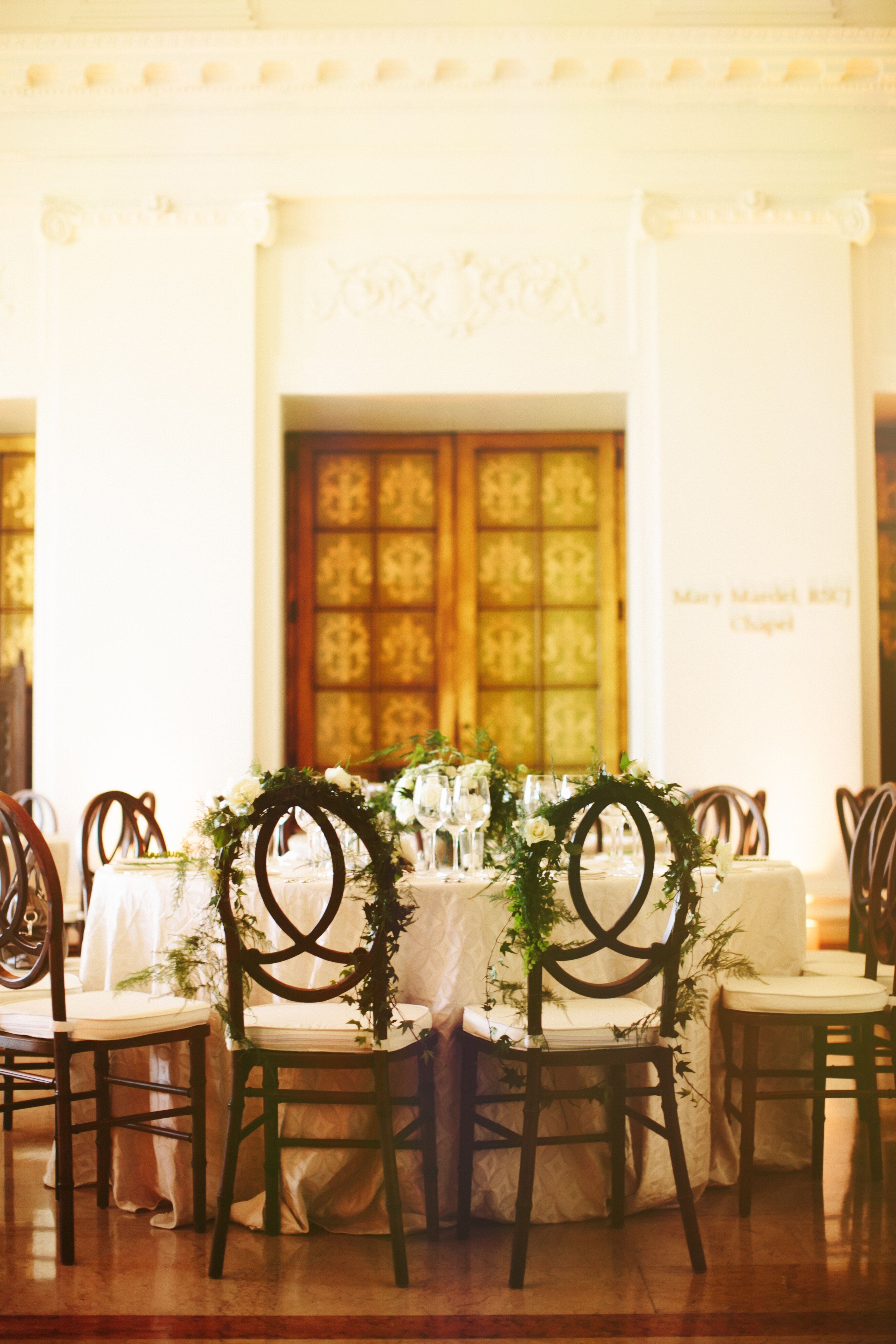 Garnished Newlywed Chairs at Reception