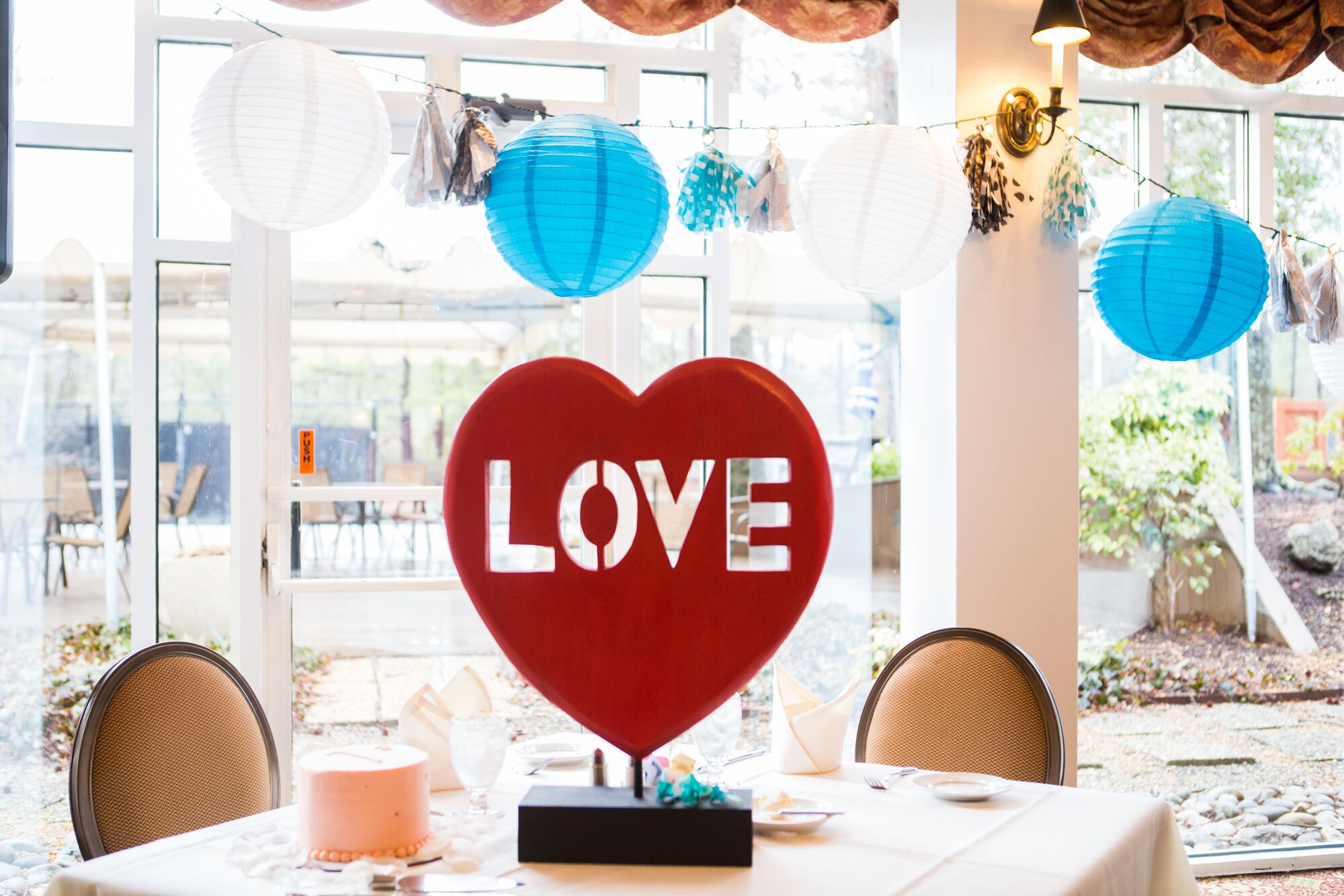 Love Sign at Sweetheart Table and Blue and White Lanterns