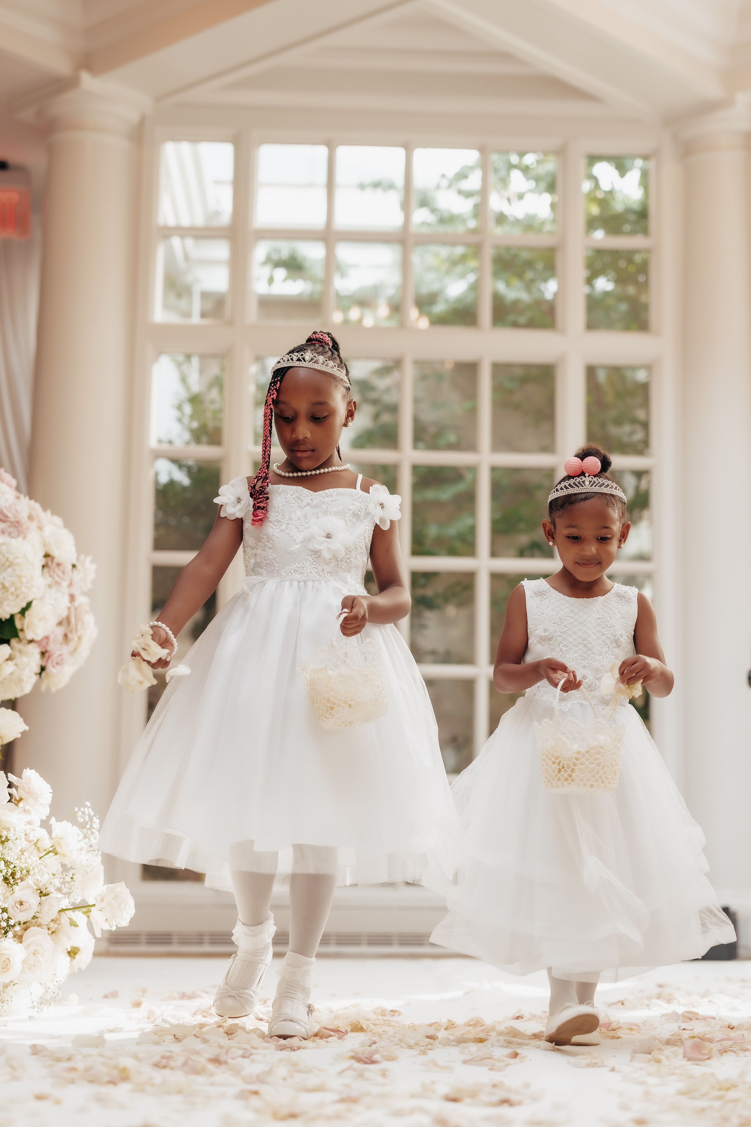 Flower Girls in White Dresses and Crowns Dropping White Petals Down ...
