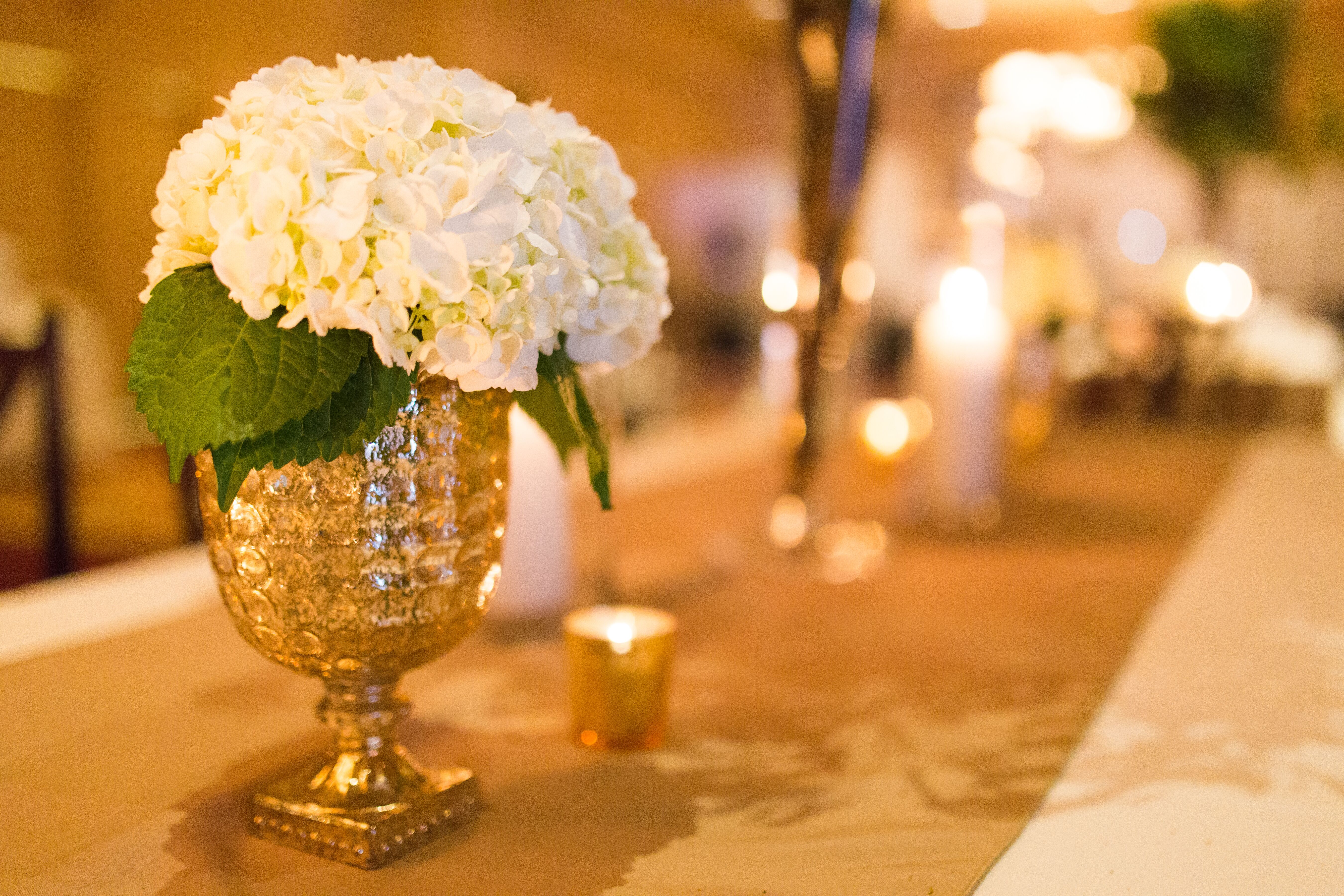 White Hydrangea Accent in Gold Vase