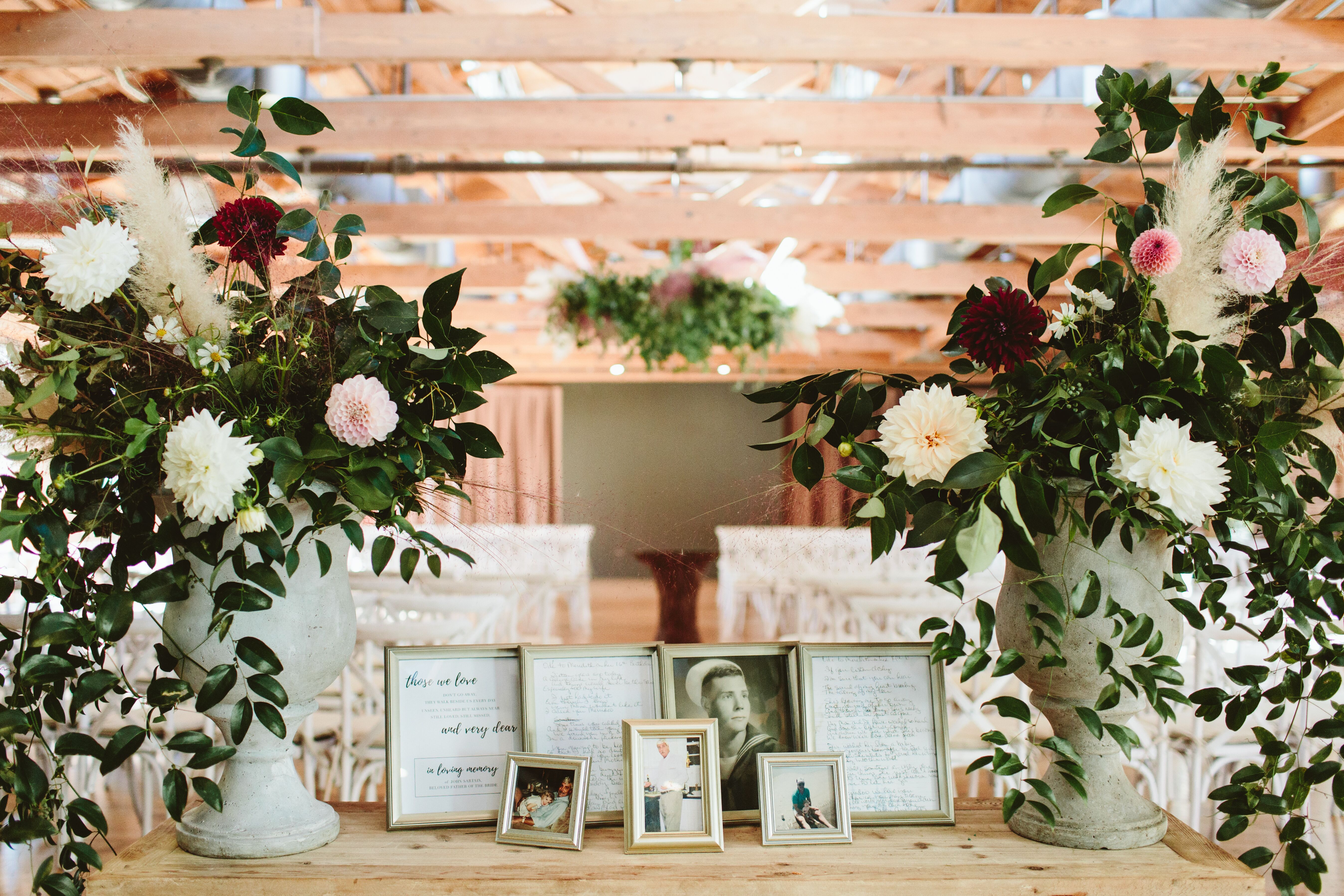 Vintage Table for Remembering Loved Ones with Flower Arrangements