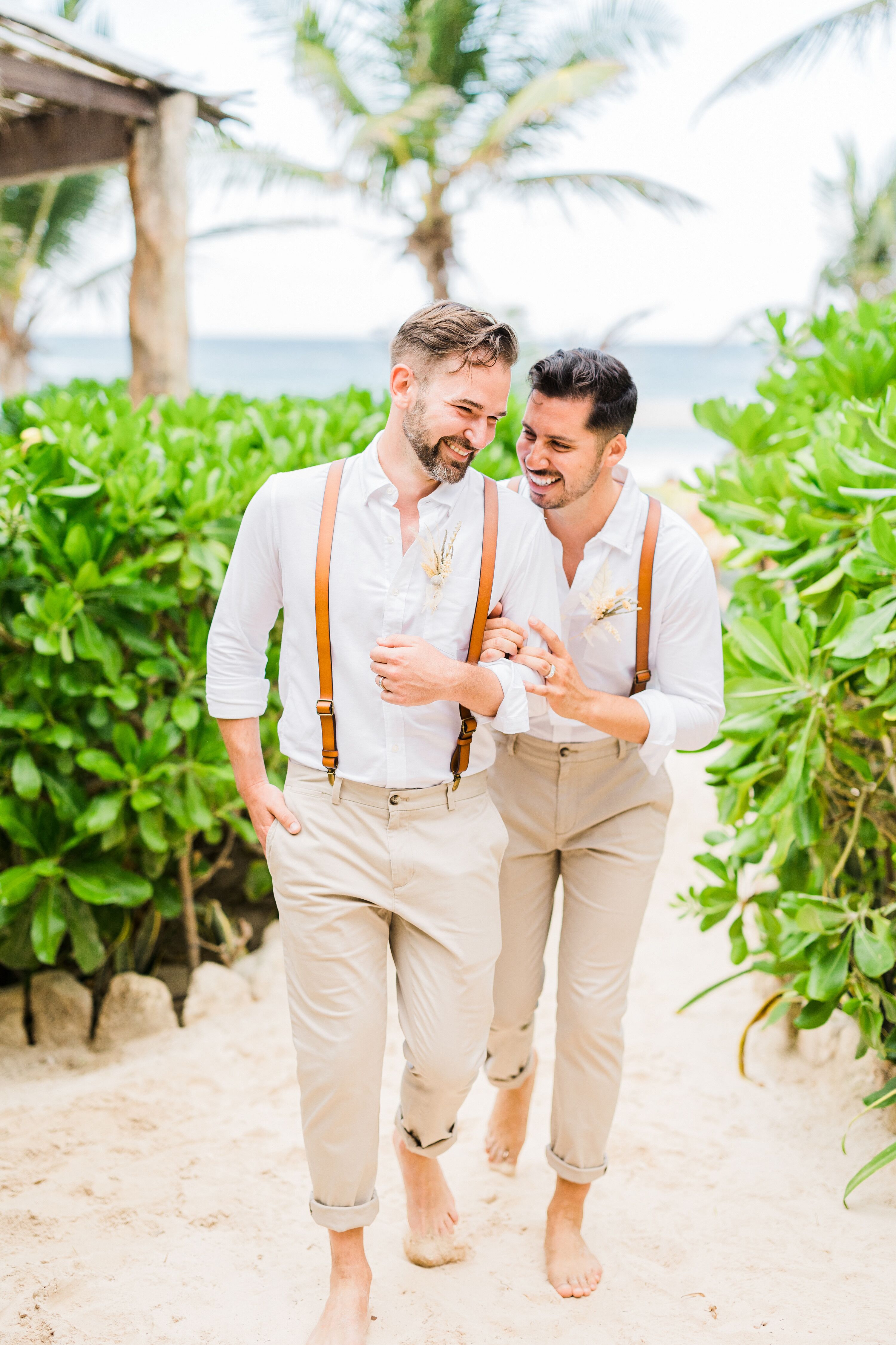 Two Grooms Walking Together After Beach Ceremony, Barefoot