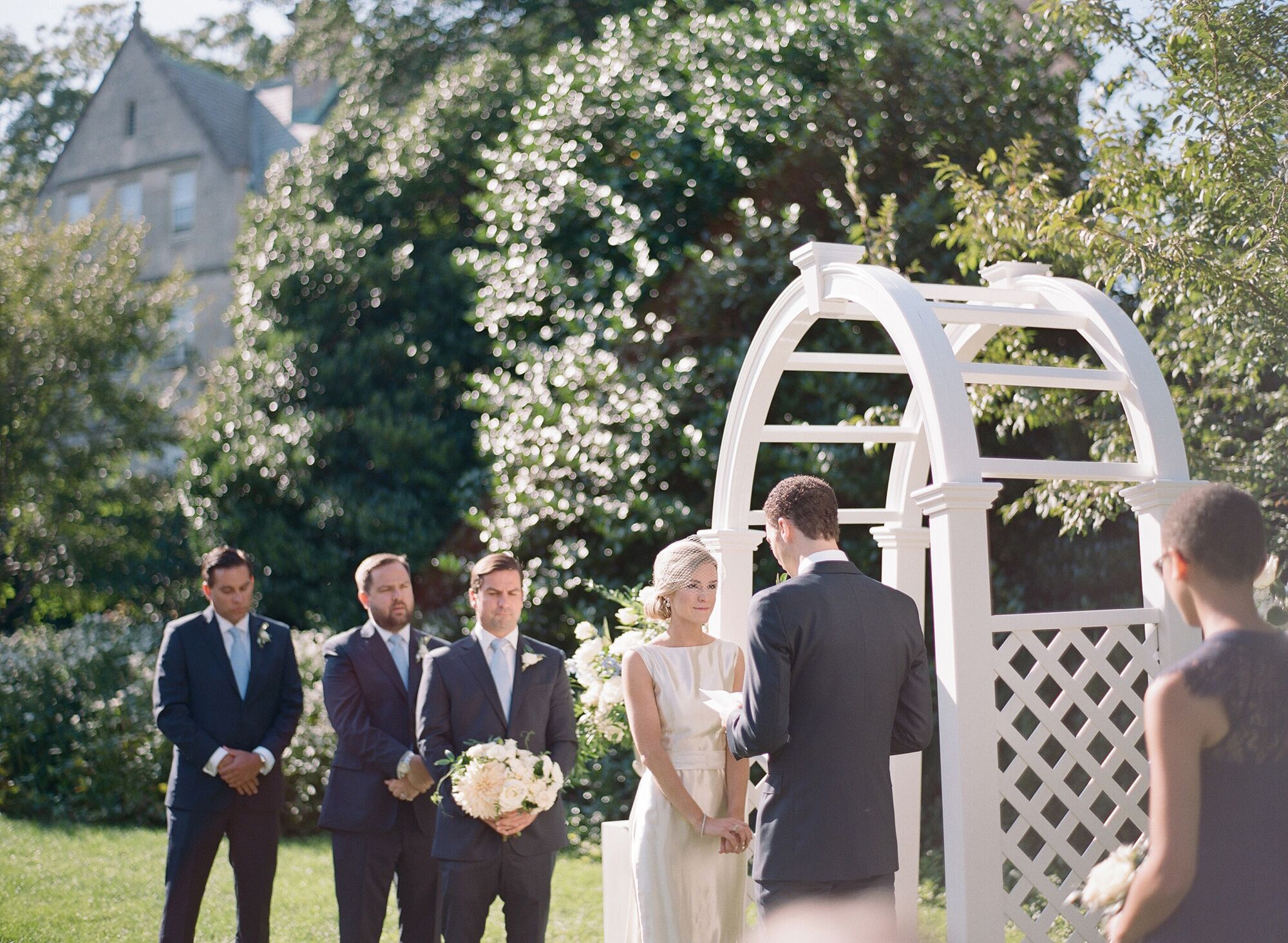 Couple Saying Vows at Outdoor Ceremony