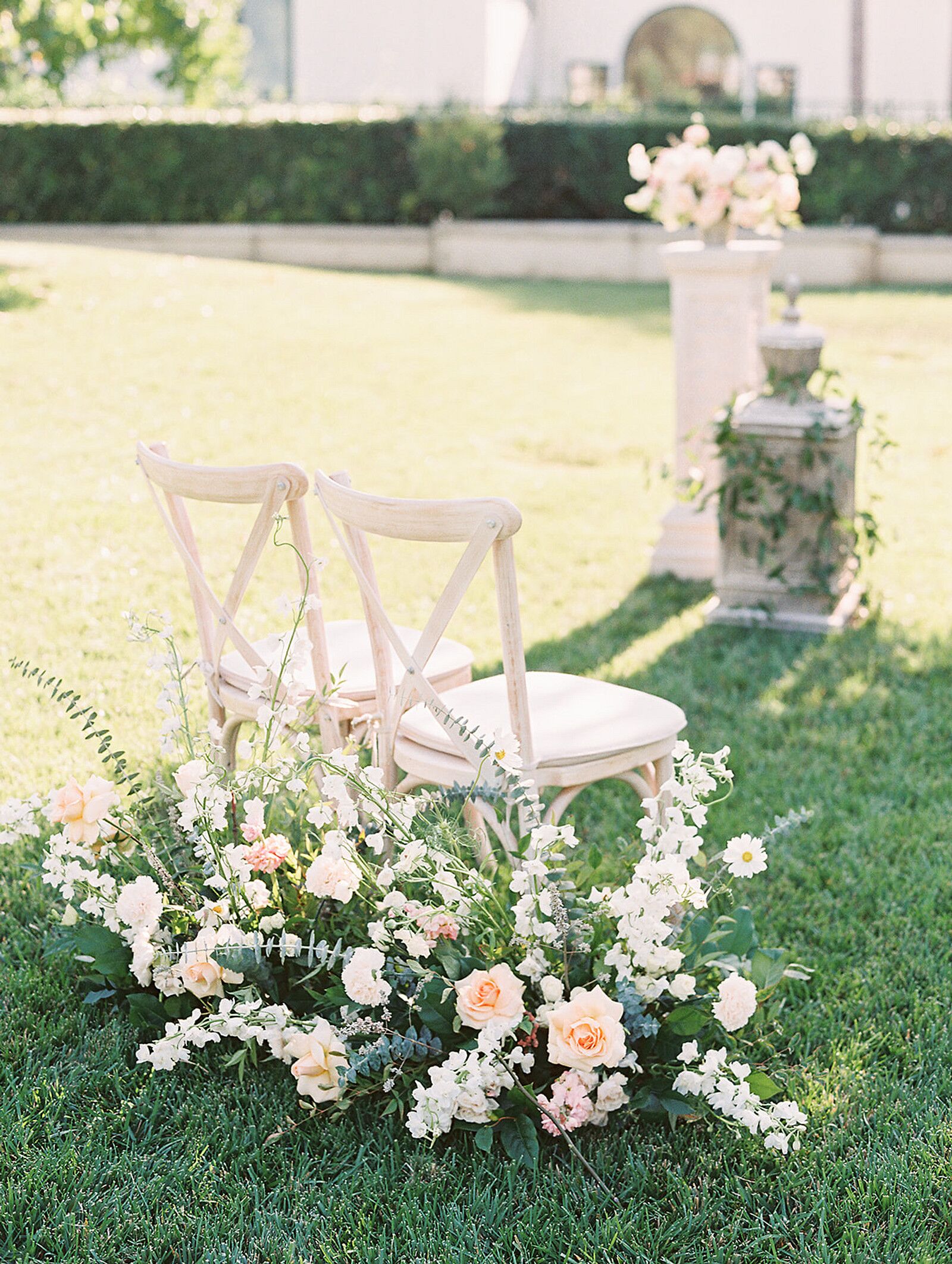 White Cross-Back Chairs for Backyard Wedding Ceremony