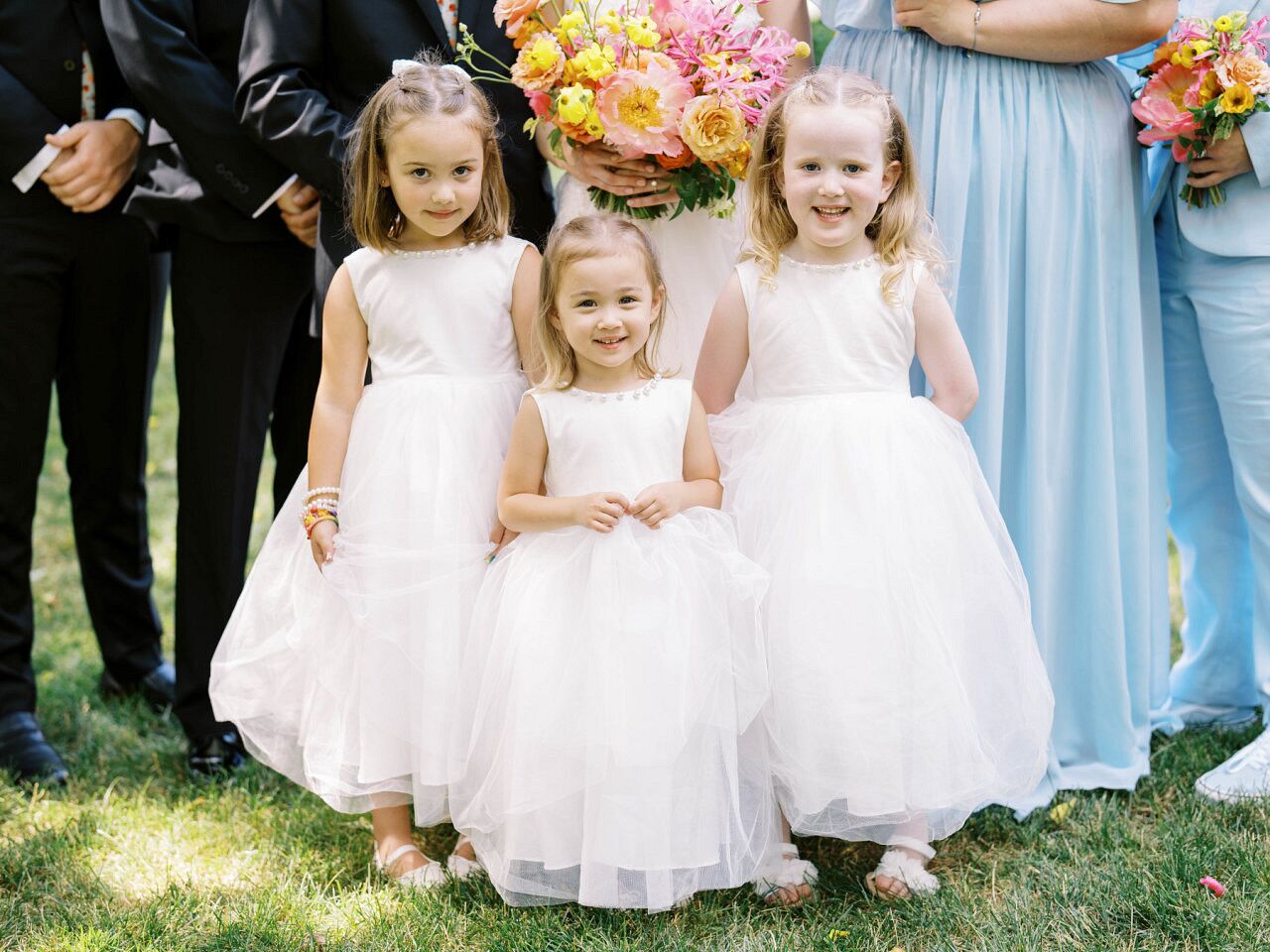 Three Adorable Flower Girls in the Same Light Pink Dresses