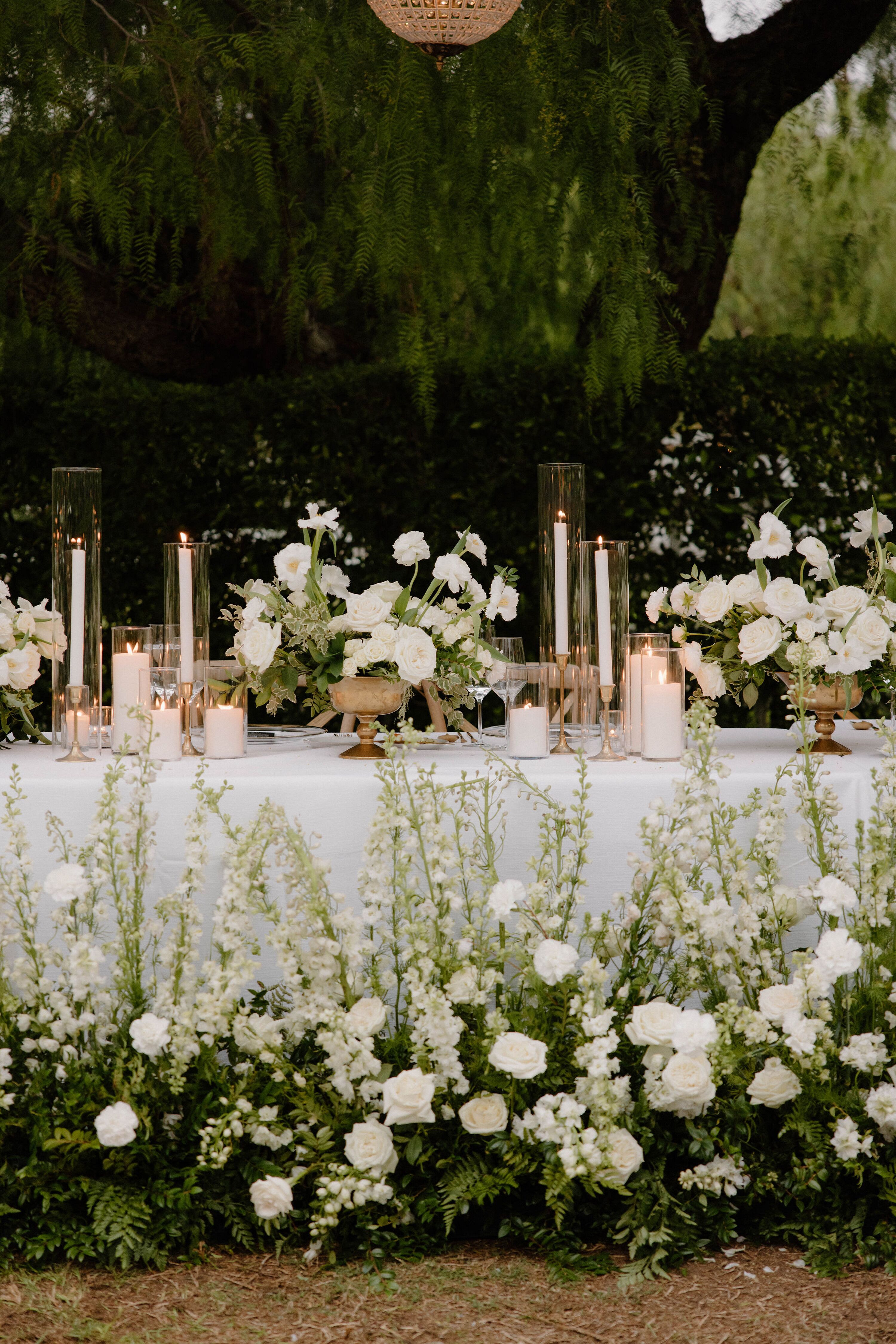 Long Table, White Linen and Flowers With Floor Floral Arrangements, Candles