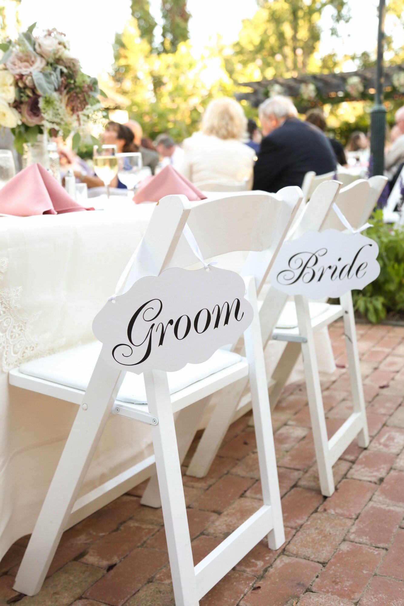 Bride and Groom Signs on Chairs
